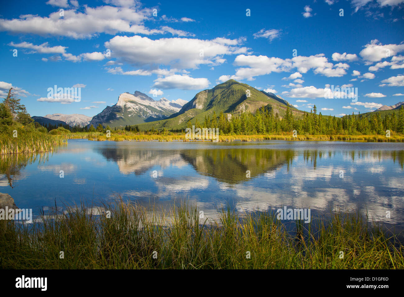 Mount Rundle and Sulphur Mountain reflecting in Vermillion Lakes in ...