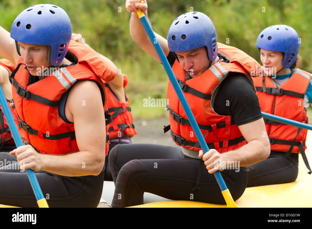 Group Of Young Athletes Training For Whitewater Rafting Stock Photo - Alamy