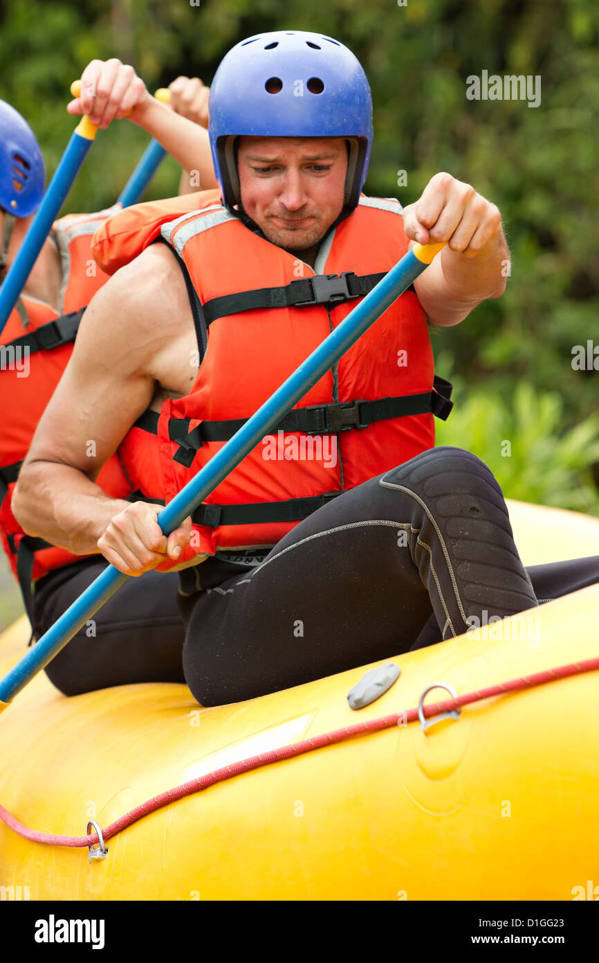 Group Of Young Athletes Training For Whitewater Rafting Stock Photo - Alamy