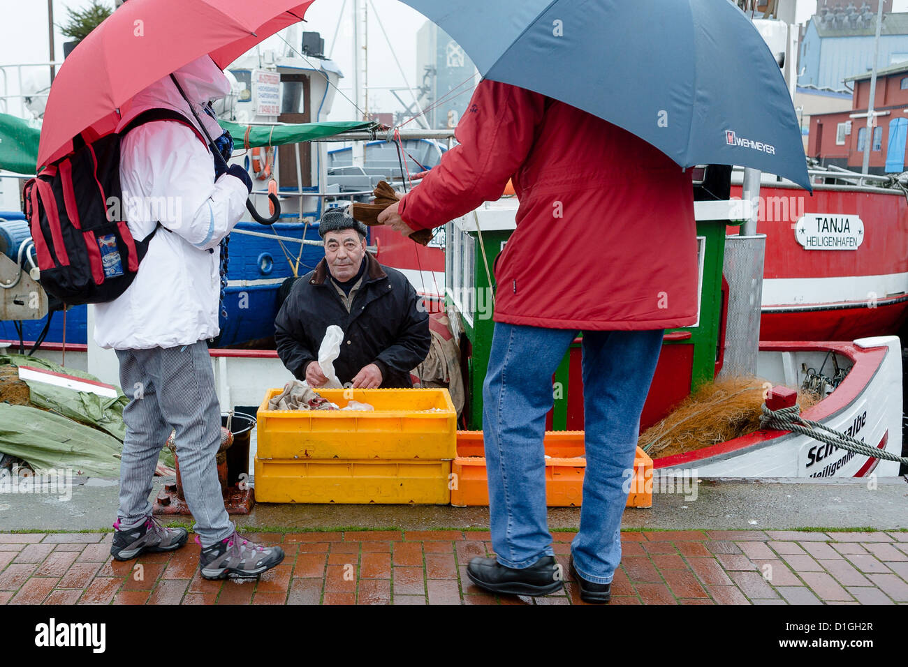 Fisher Emil Henke sells cod to customers directly from the fishing ...