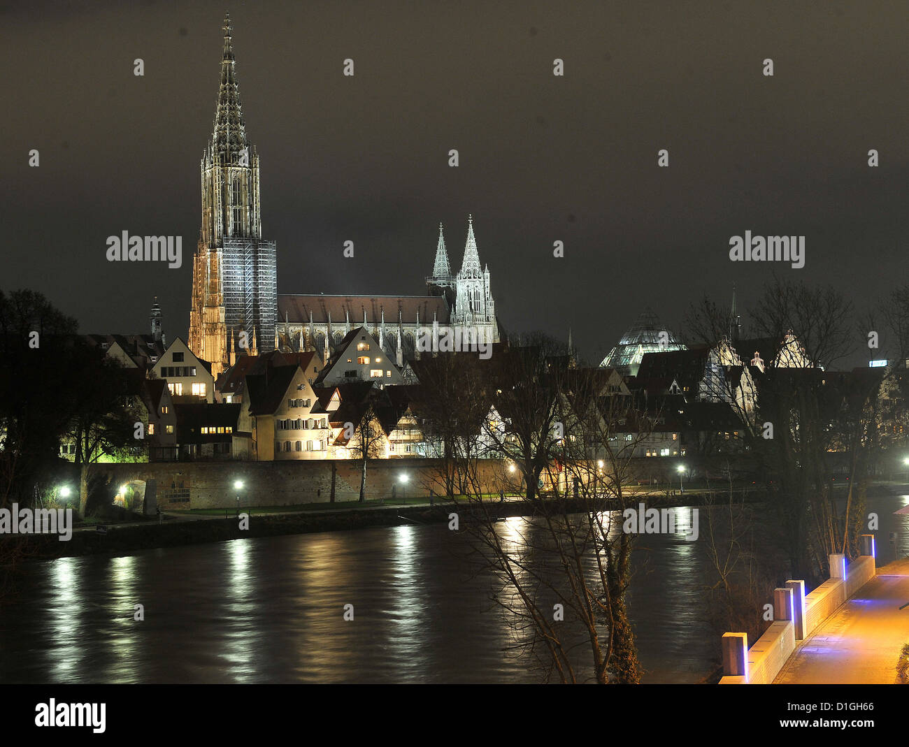 The world's tallest spire of the Ulm Minster towers above the city in ...