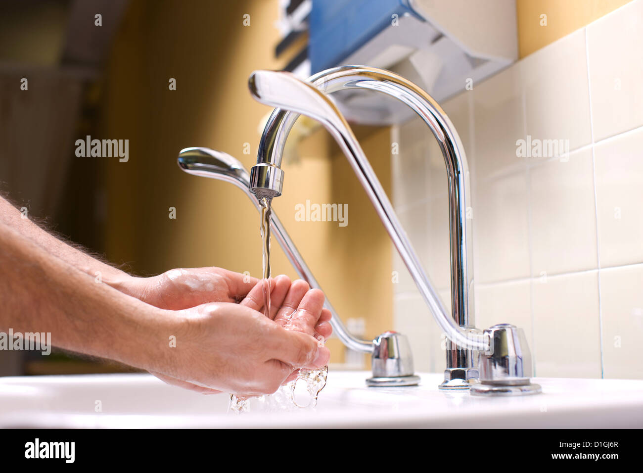 Bath room rooms basin basins tap taps hands washing hi-res stock ...