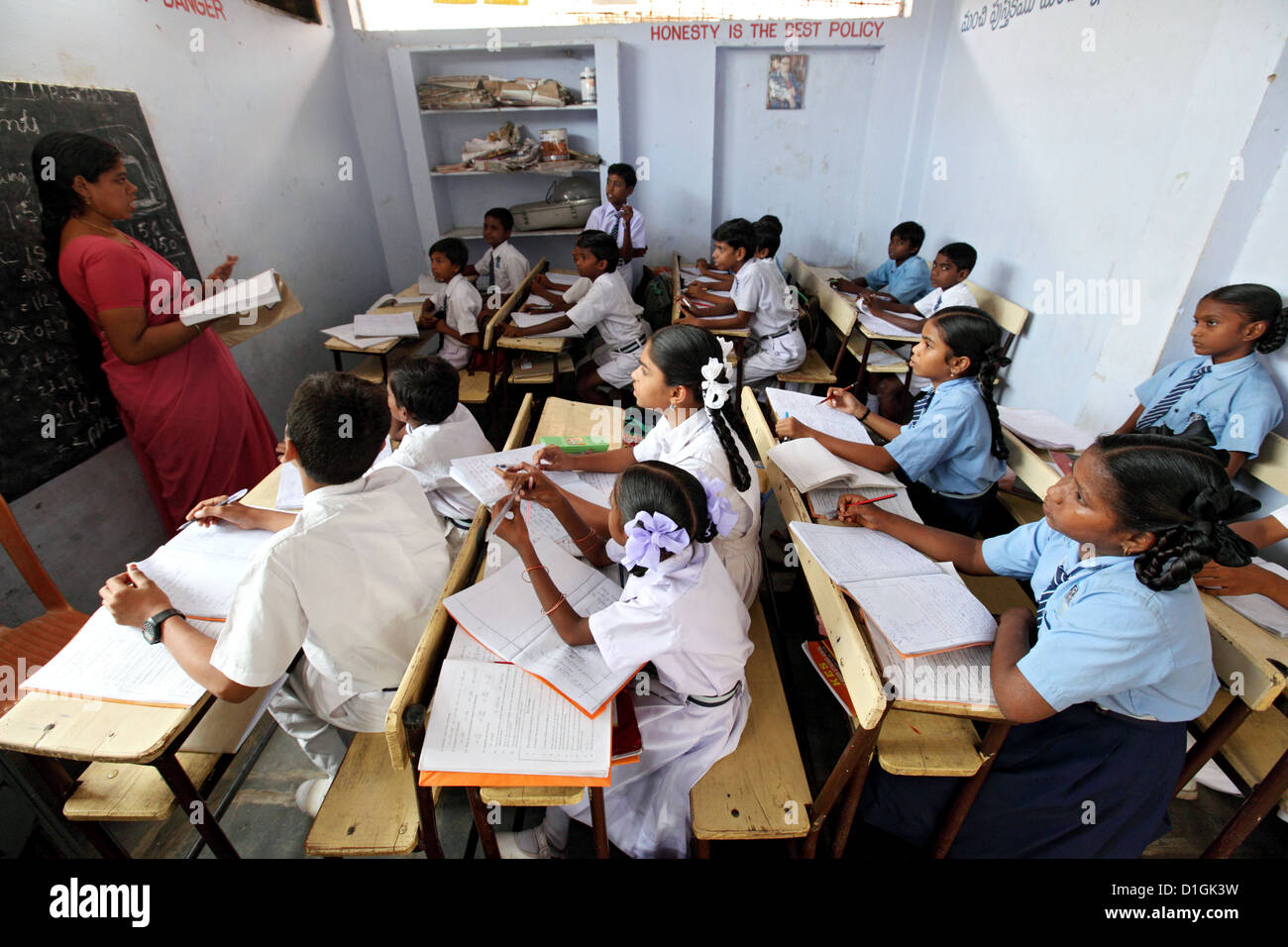 Vijayawada, India, a school class in the classroom with the teacher ...