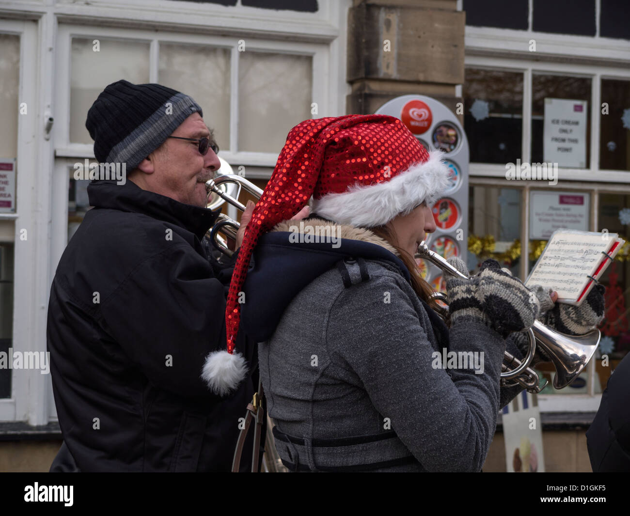 people playing musical instruments in a brass band during December ...