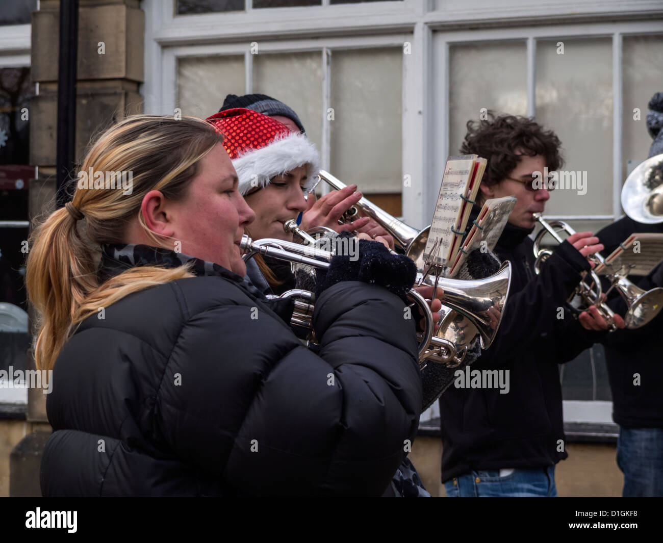 people playing musical instruments in a brass band during December ...