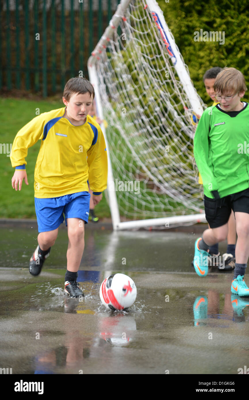 Football raining wet training hi-res stock photography and images - Alamy