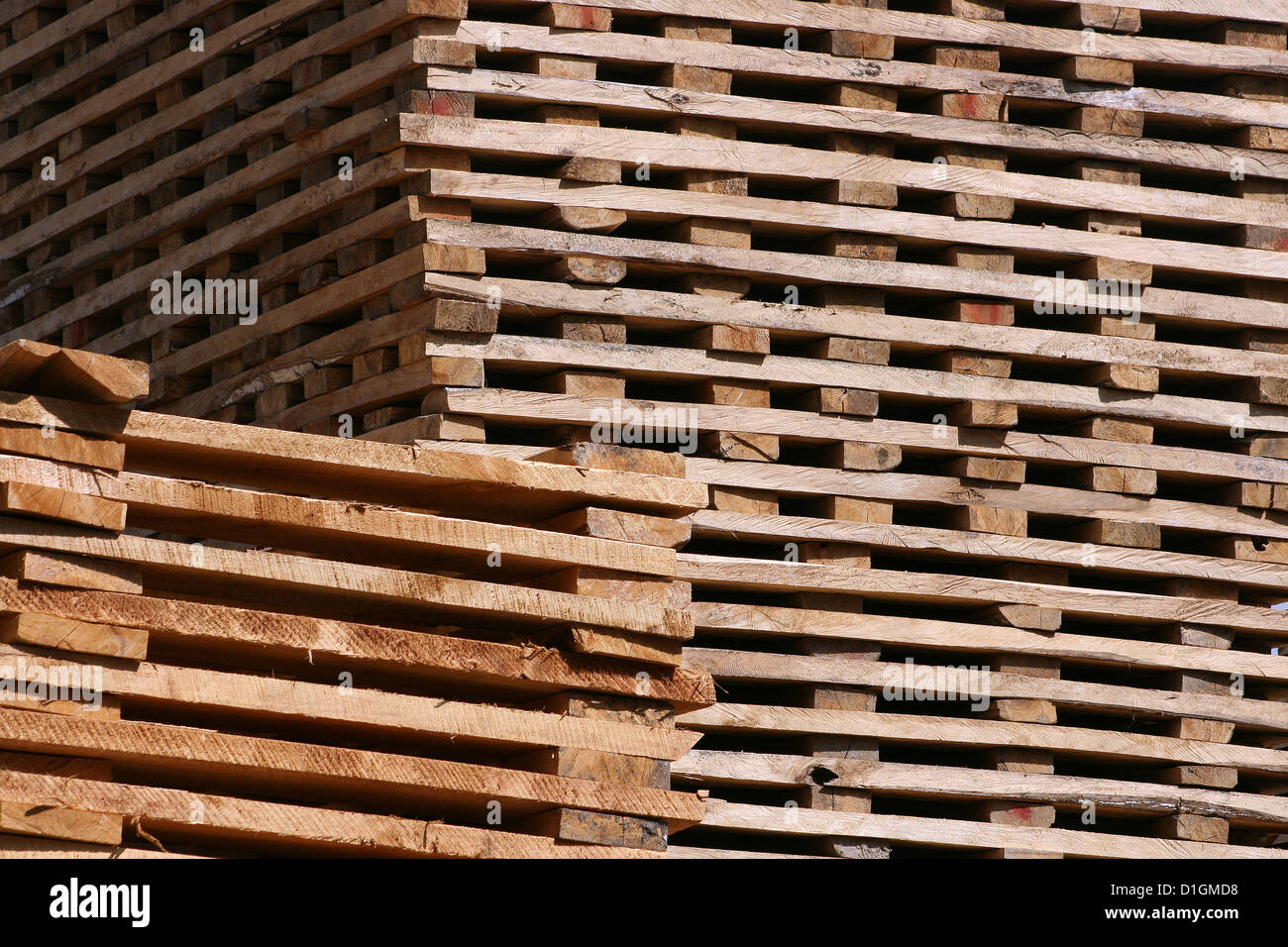 Freshly cut lumber drying in the sun in an outdoor sawmill and lumber ...