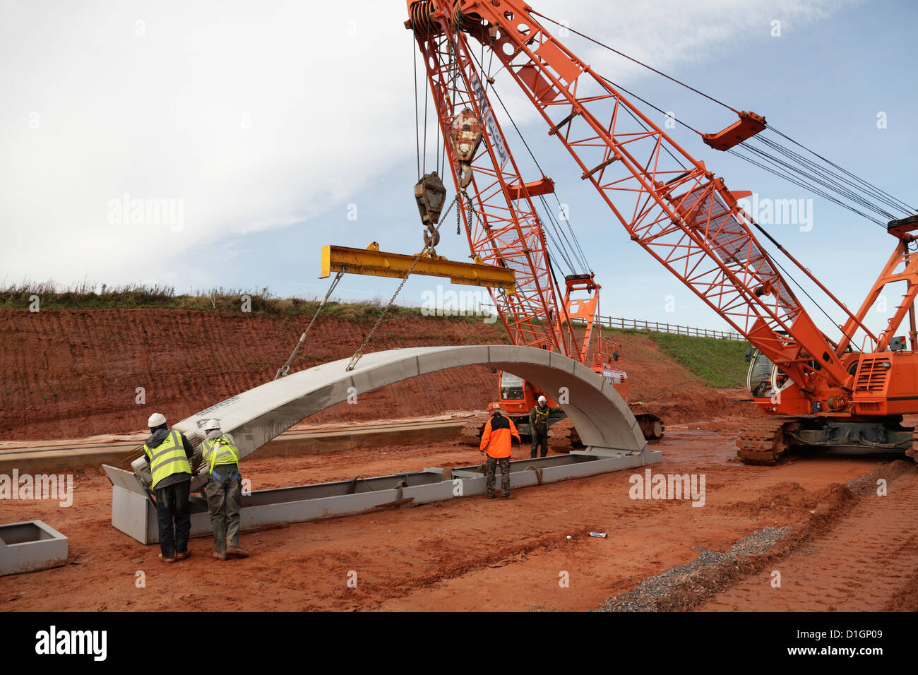 Bebo Arch bridge of precast reinforced concrete sections being lifted ...