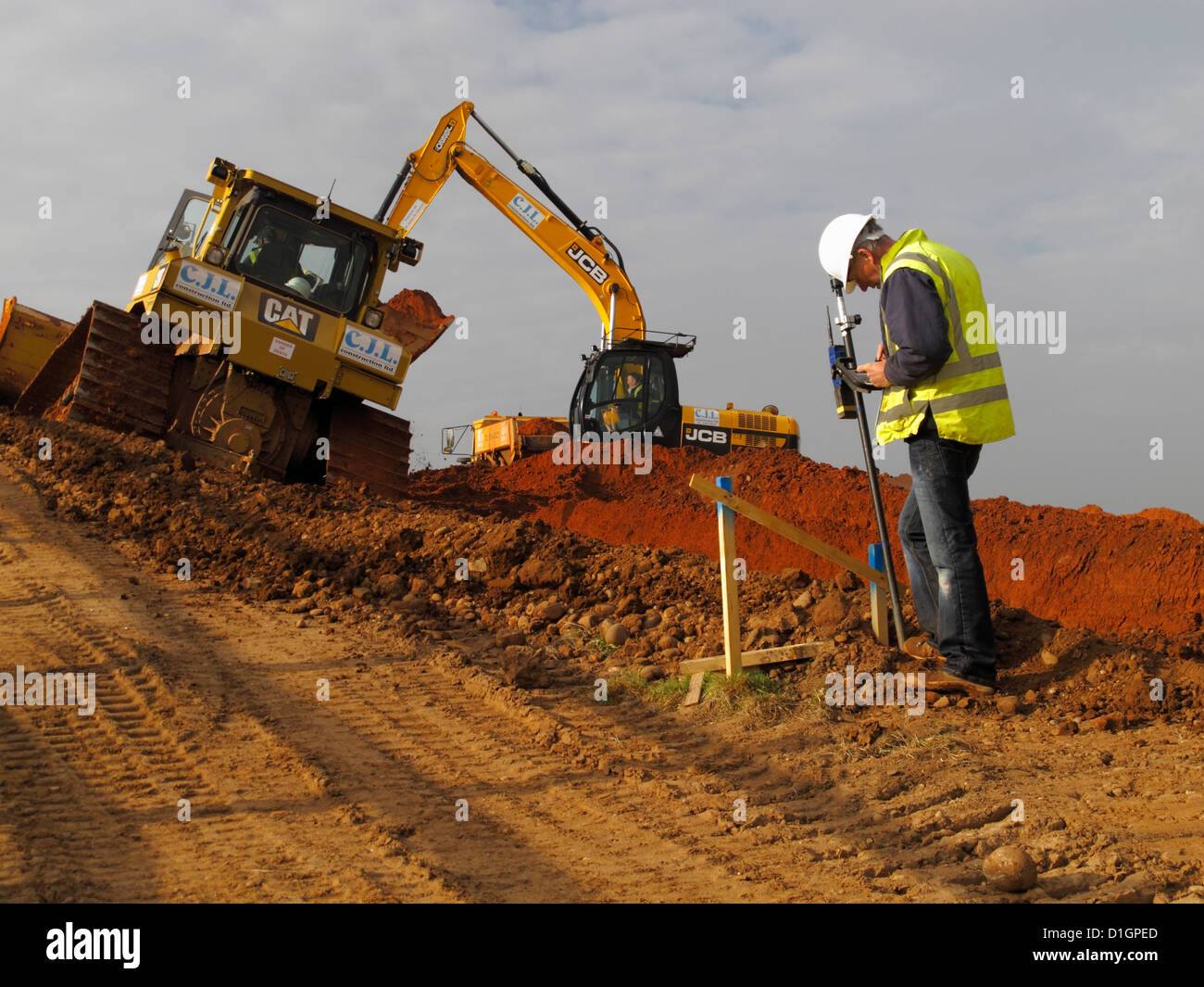 Working track hoe machine High Resolution Stock Photography and Images ...