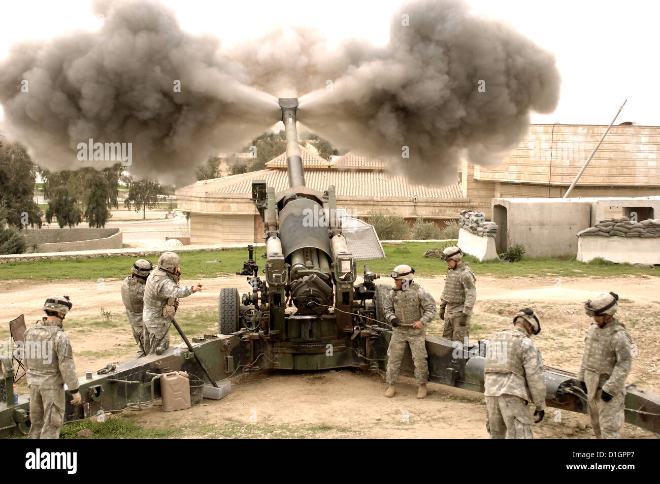 US Army Soldiers perform calibration fire with a howitzer March 6, 2006 ...