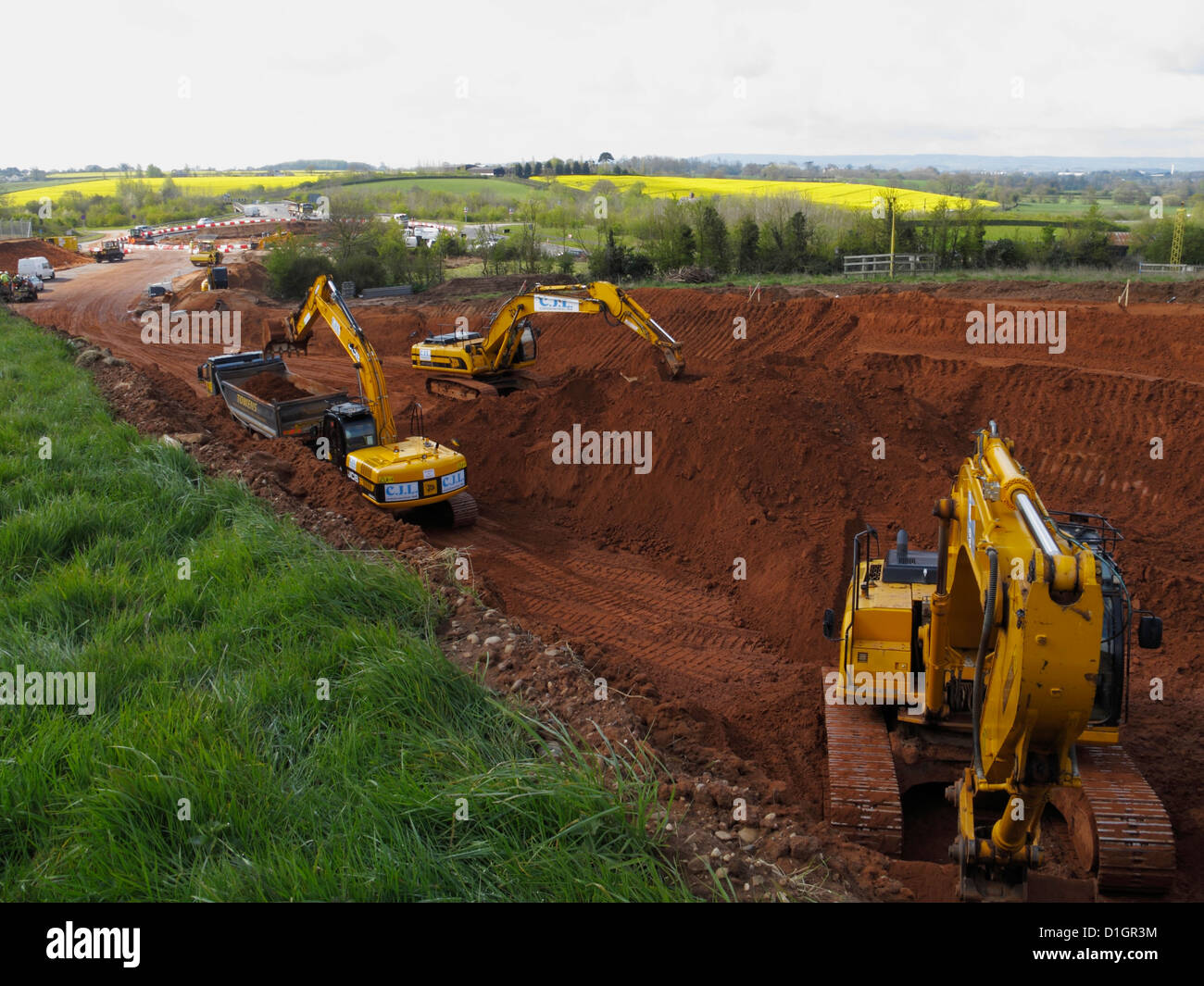 Large tracked jcb excavators digging cutting earthworks loading Stock ...