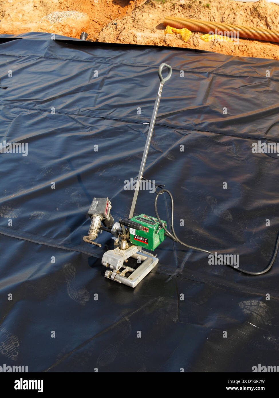 In situ plastic welding joining sheet waterproofing membrane around ...