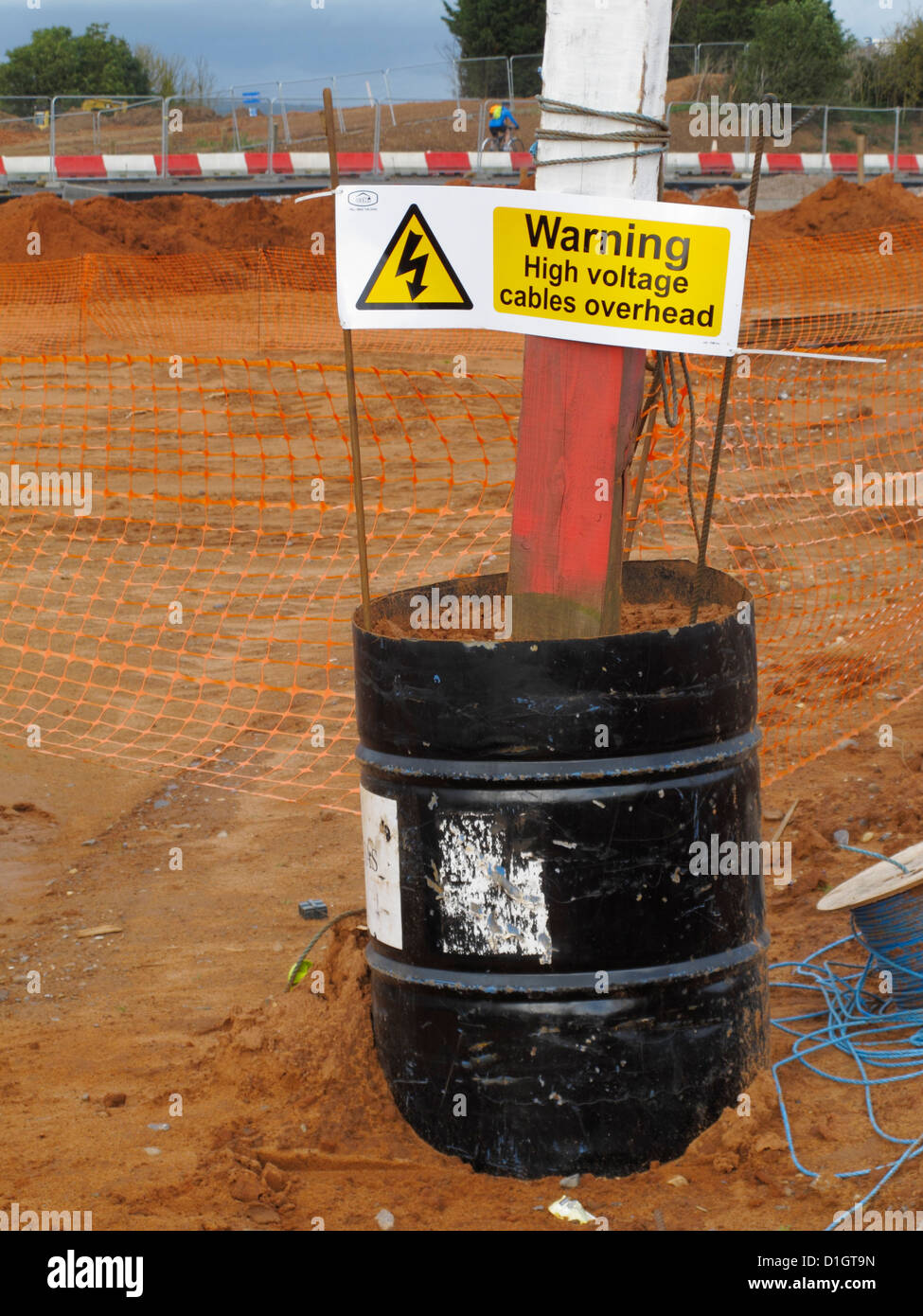 Warning High voltage cables overhead danger sign UK road construction ...