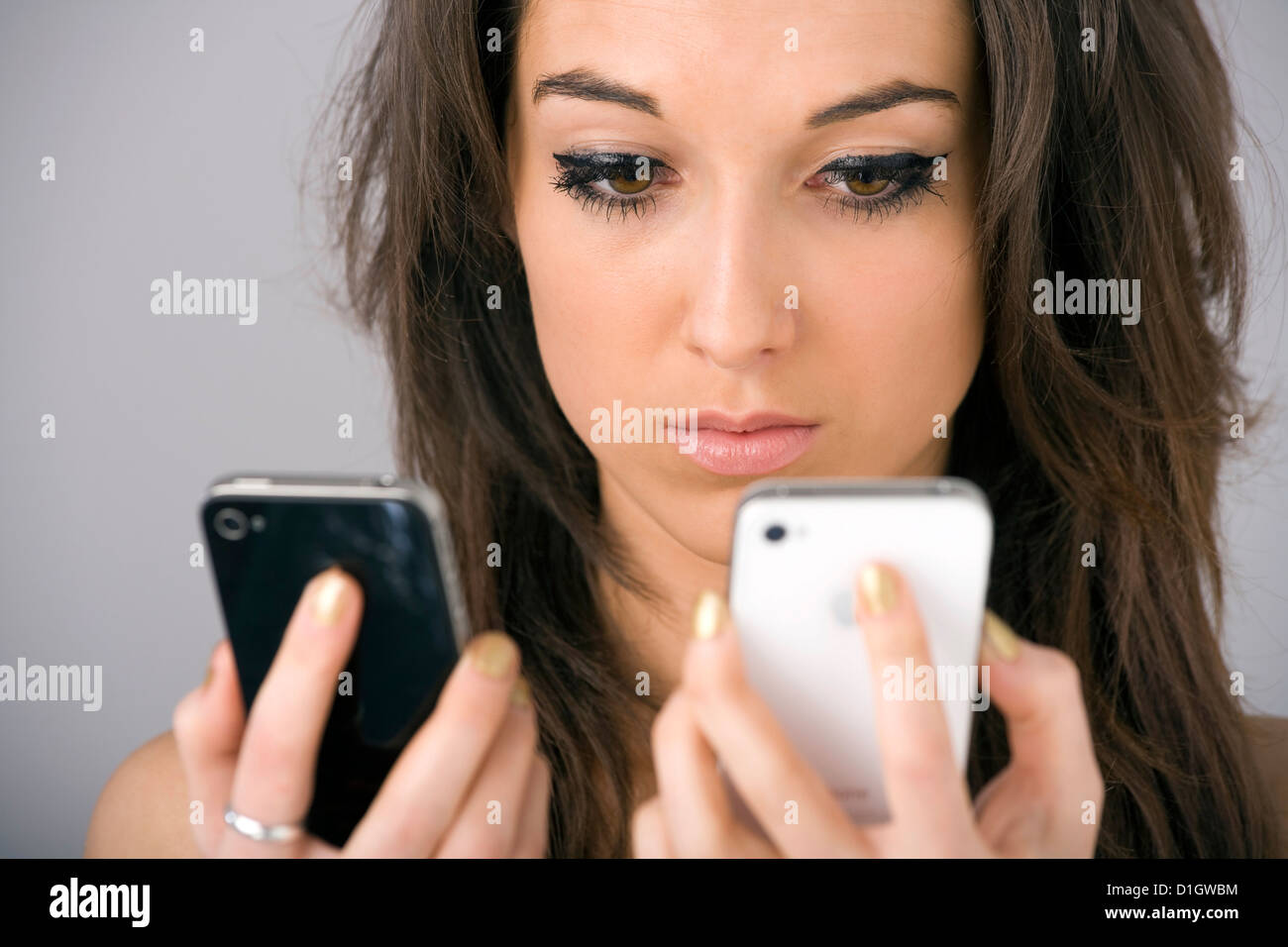 Two hands holding iphone hi-res stock photography and images - Alamy