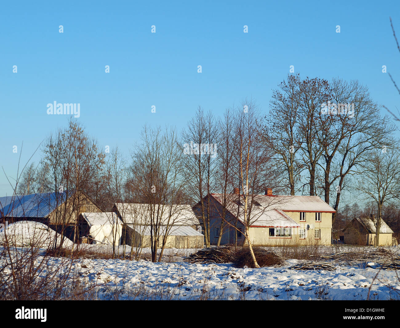 Small country farm buildings - house and barns in winter Stock Photo ...