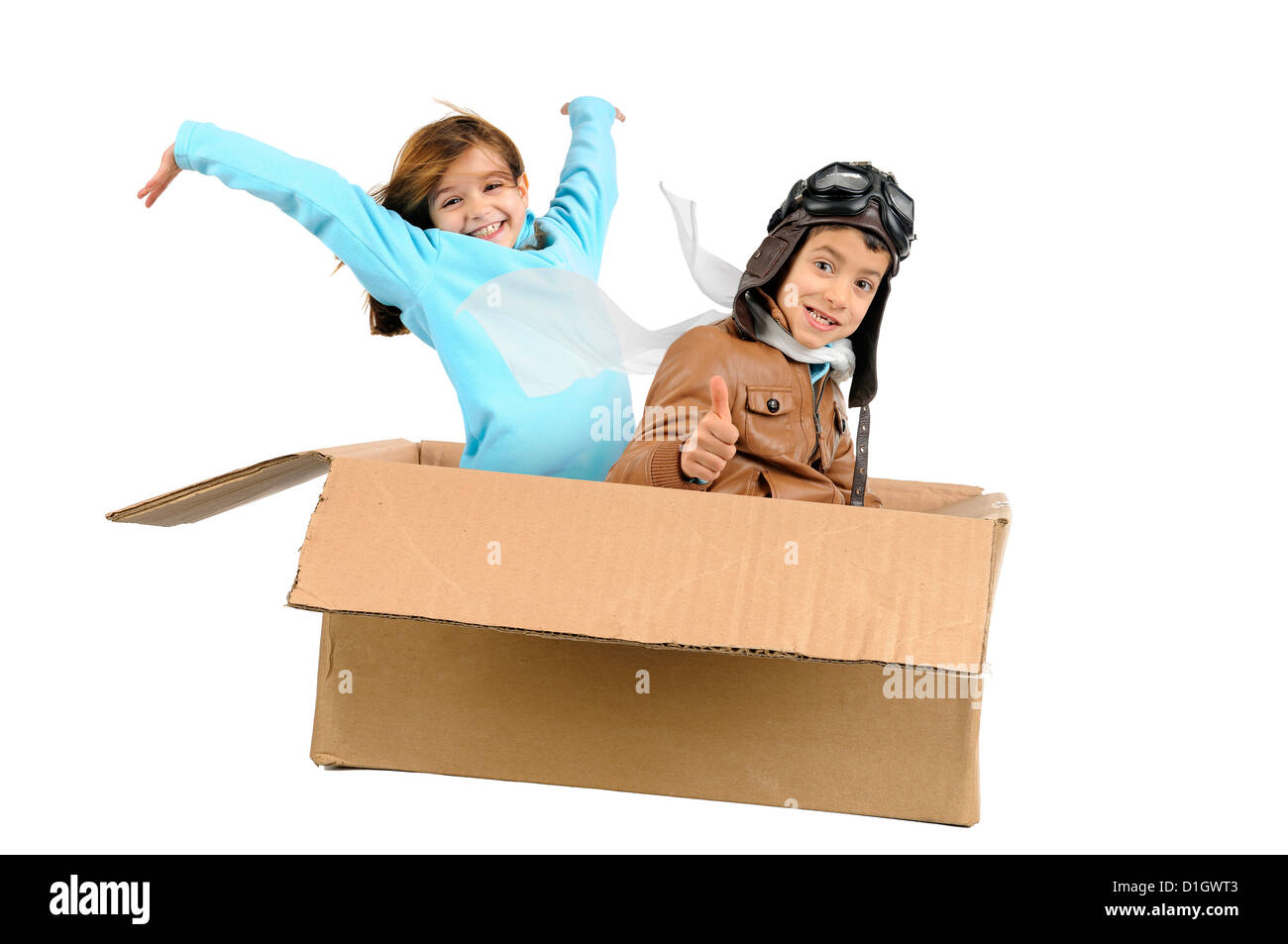Young couple pilot flying a cardboard box isolated in white Stock Photo ...