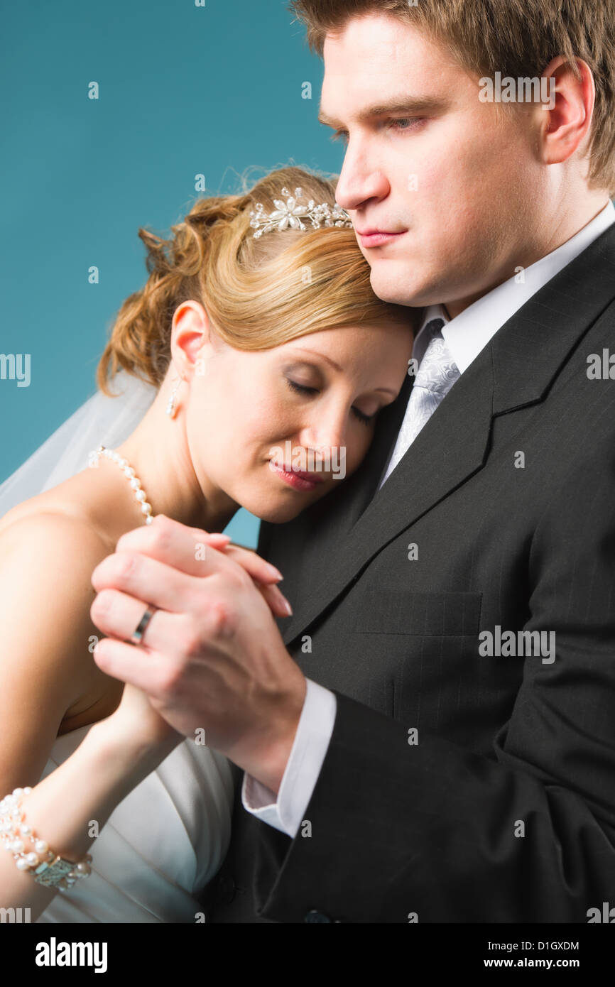 Bride and groom dancing, very narrow depth of field and focus on face ...