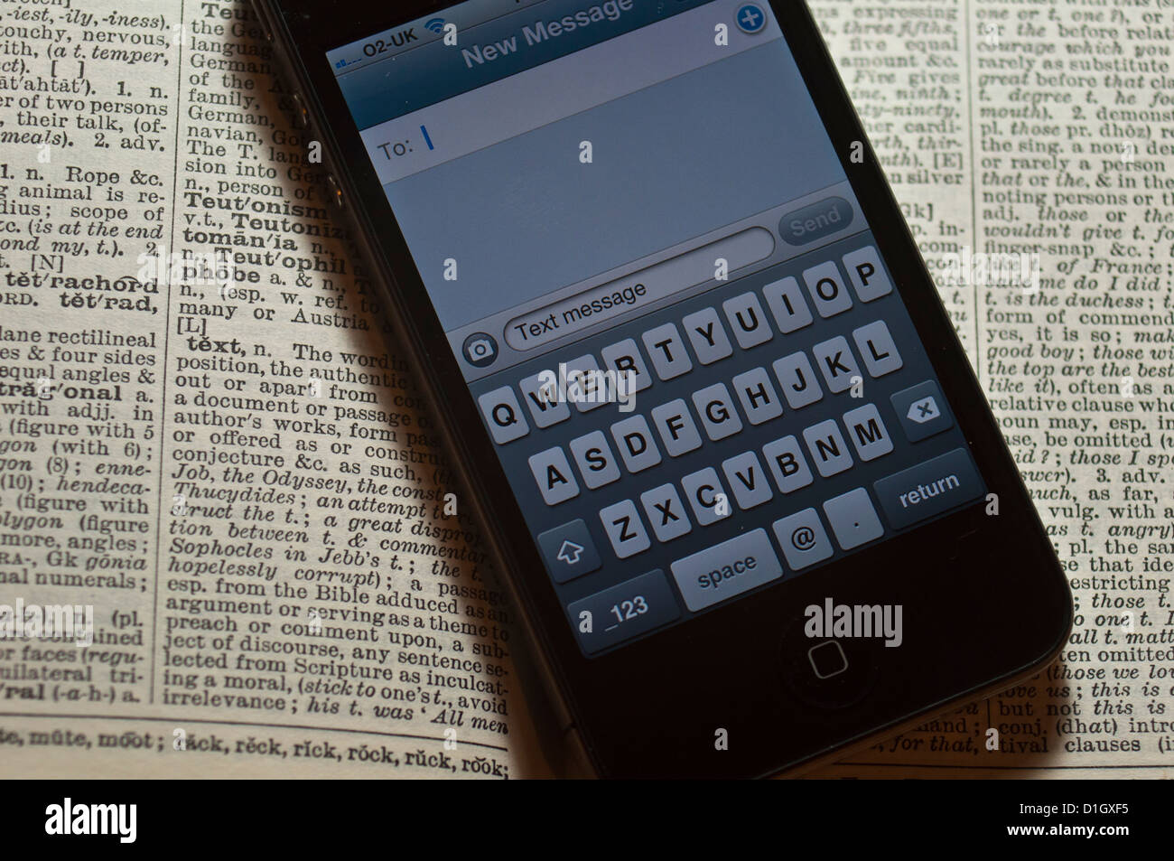 Mobile i phone text message spelling on a dictionary Stock Photo - Alamy