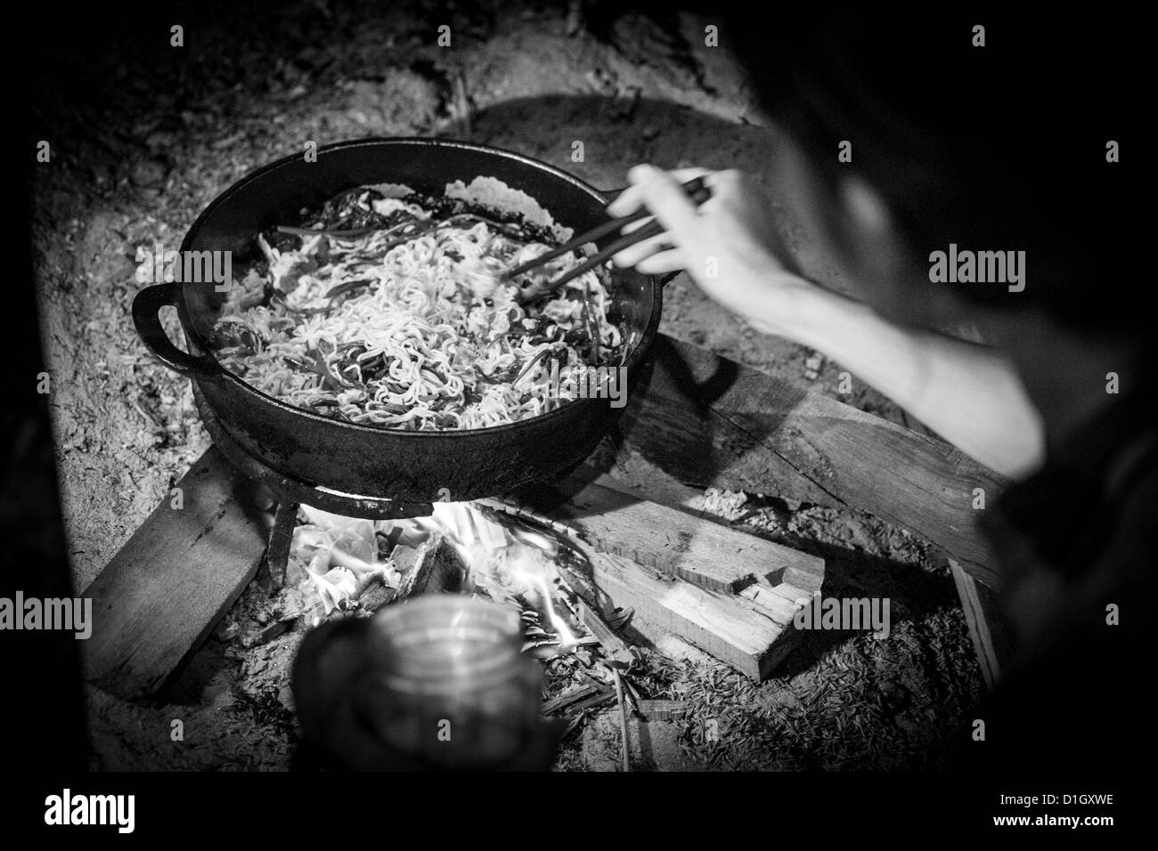 Food over fire Black and White Stock Photos & Images - Alamy