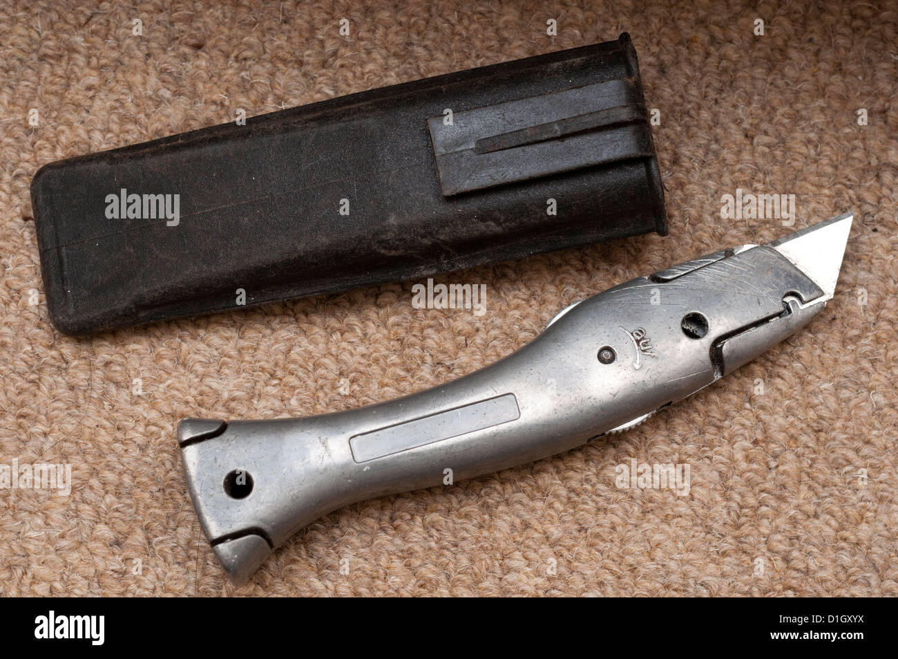 Carpet fitters knife Stock Photo - Alamy