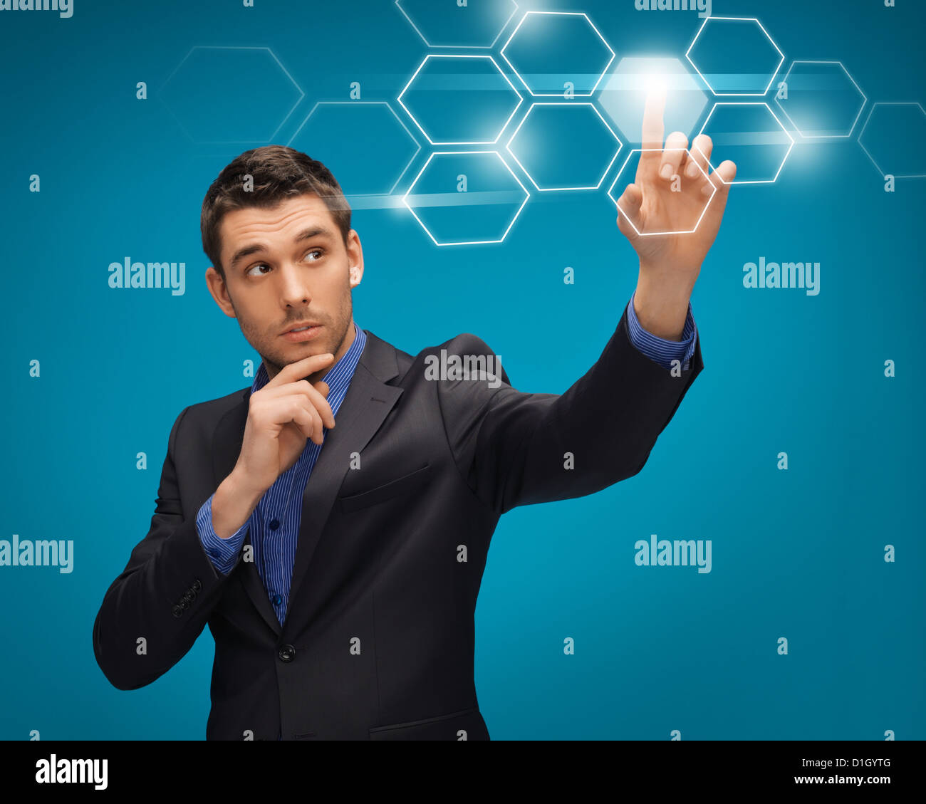 man in suit working with virtual screens Stock Photo - Alamy