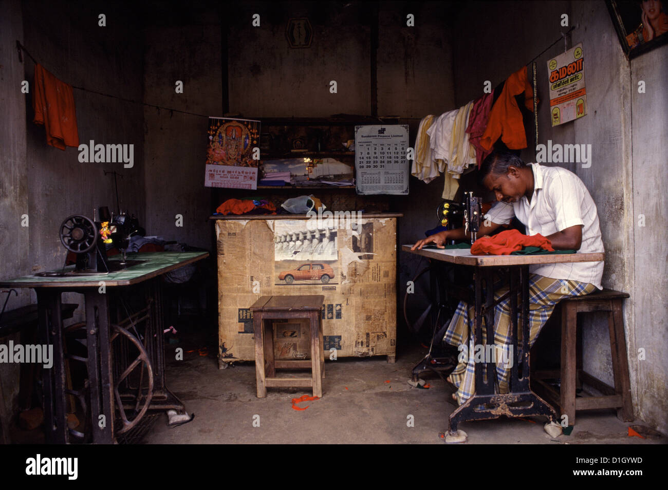 Indian tailor traditional sewing machine hi-res stock photography and ...