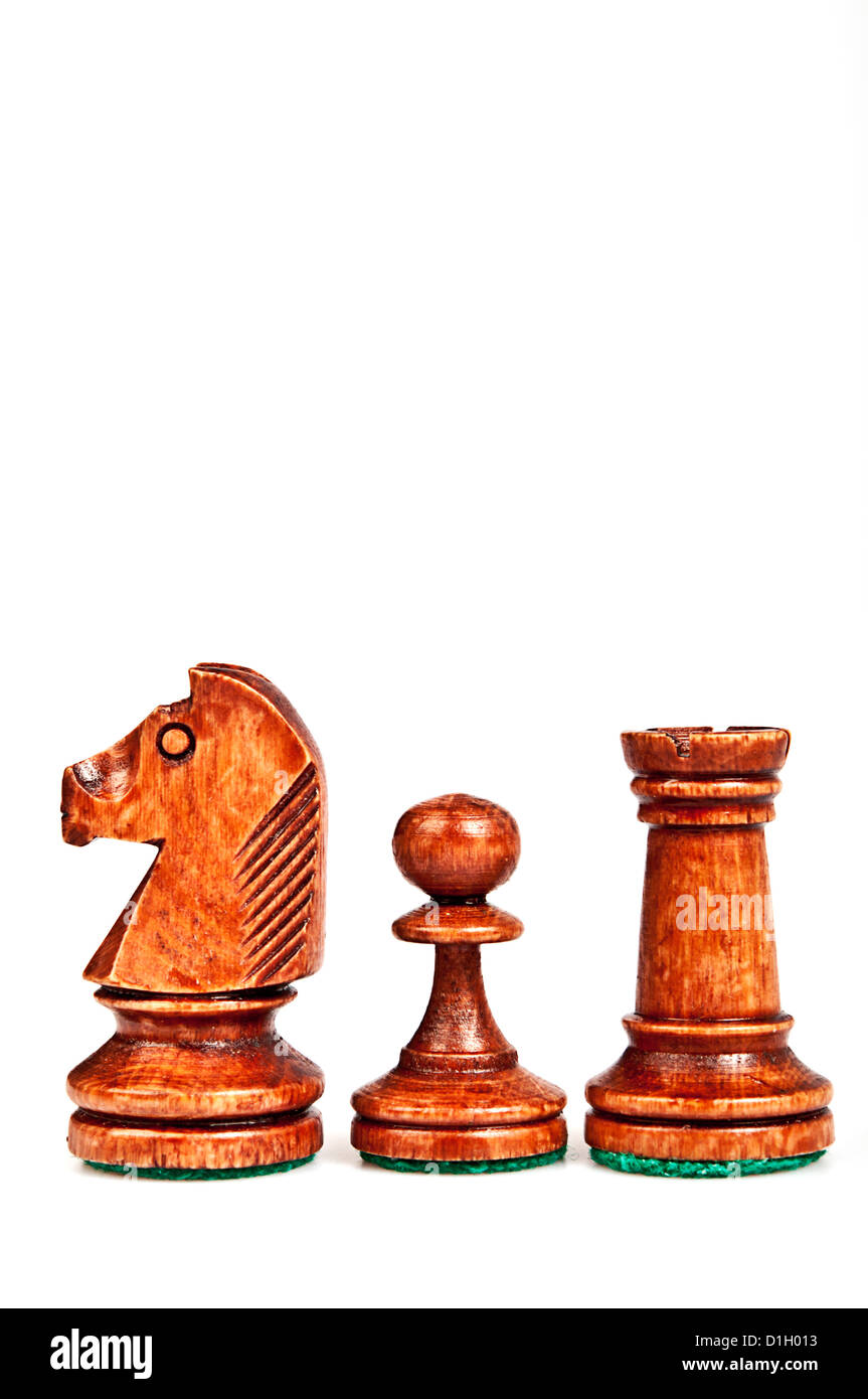 chess pieces in a row, knight rook and pawn Stock Photo - Alamy