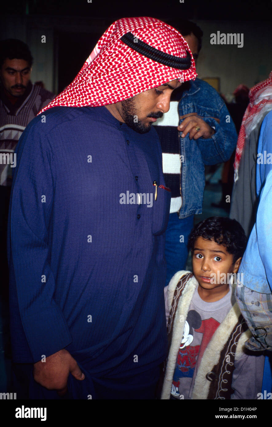 Kuwait City Kuwait Arab Father And Son At The Fish Souk Stock Photo - Alamy