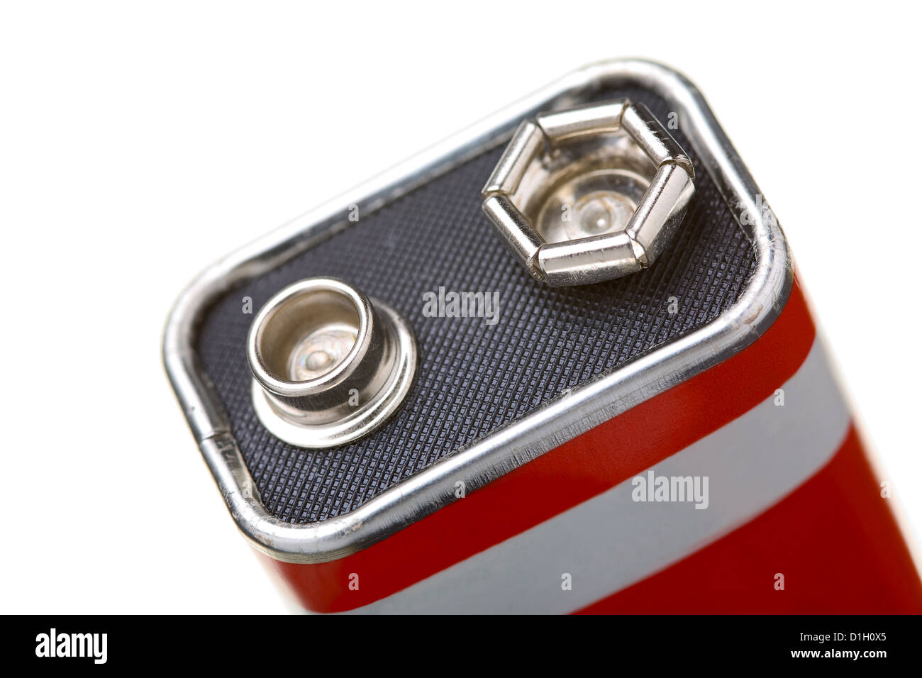 Close up of a 9 V battery isolated on white background Stock Photo - Alamy