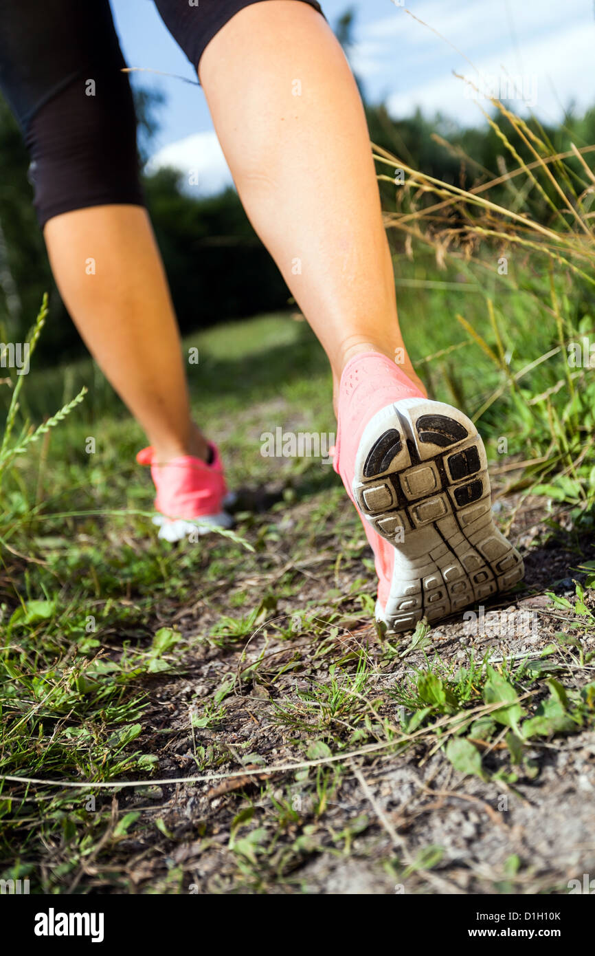 Woman legs running nature hi-res stock photography and images - Alamy