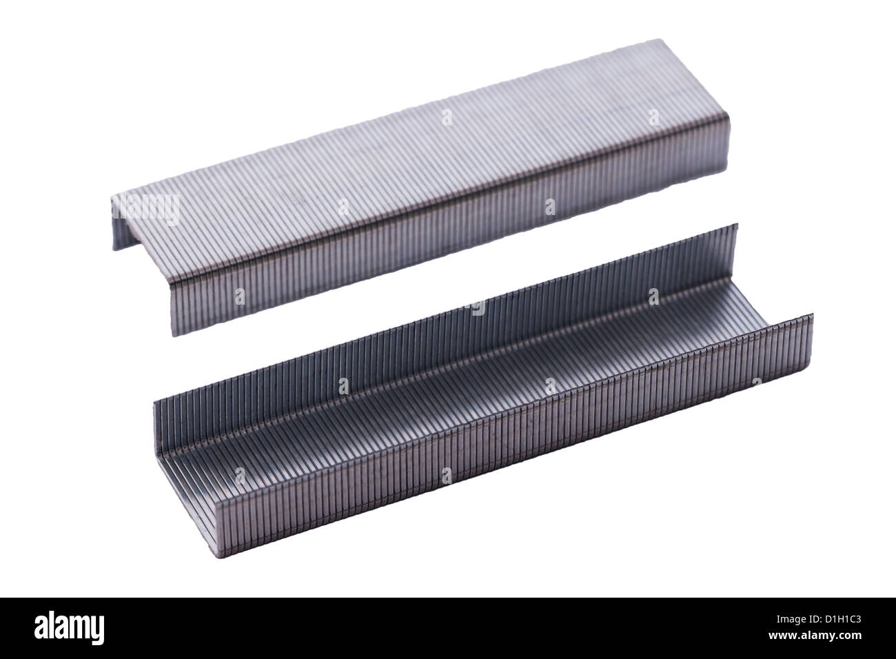 Staples on a white background Stock Photo - Alamy