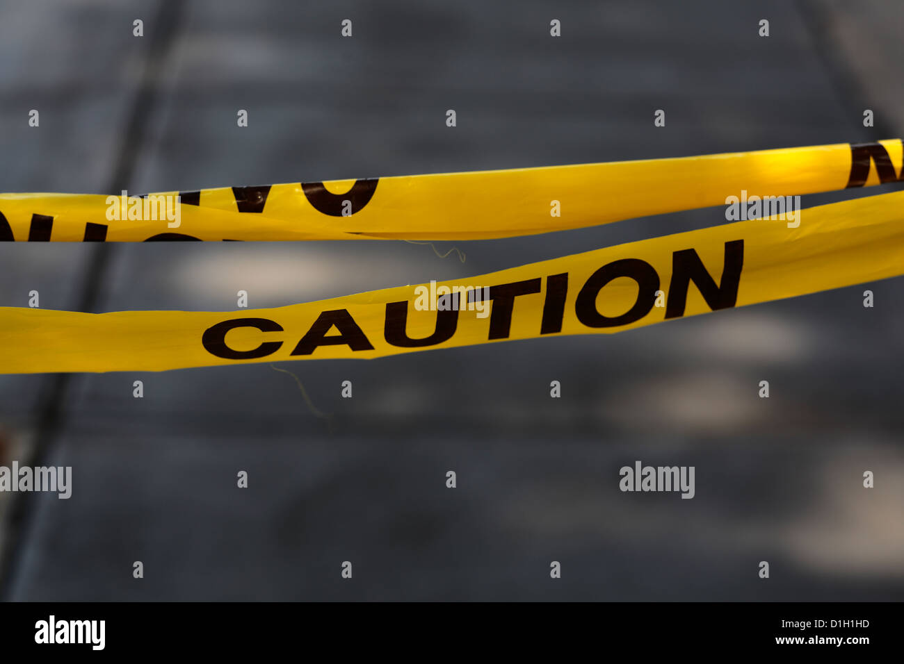 Yellow caution tape hi-res stock photography and images - Alamy