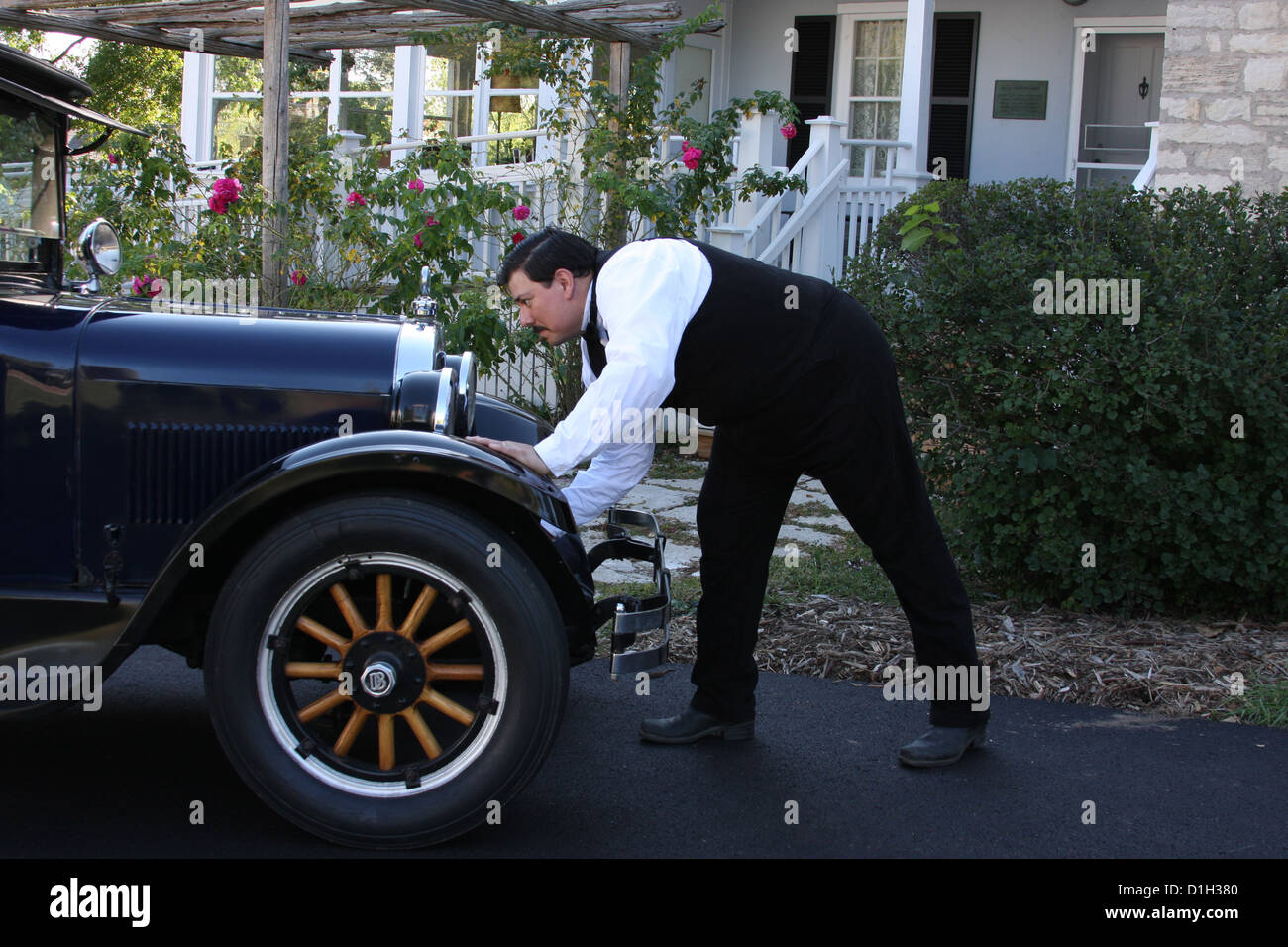 A man starting a Dodge Brothers 1925 classic car Stock Photo - Alamy