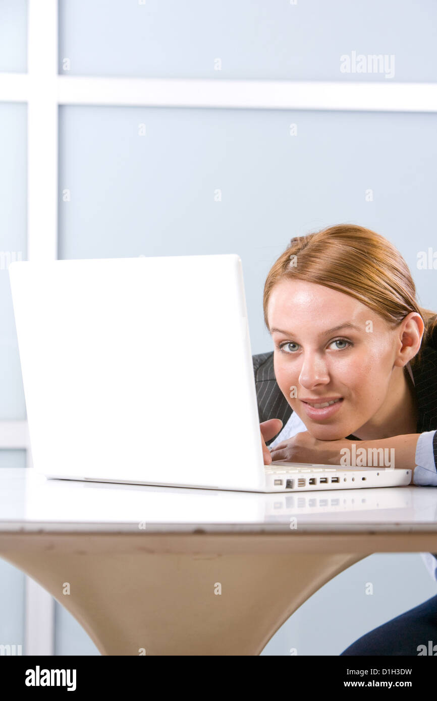Business woman laptop in modern office Stock Photo - Alamy