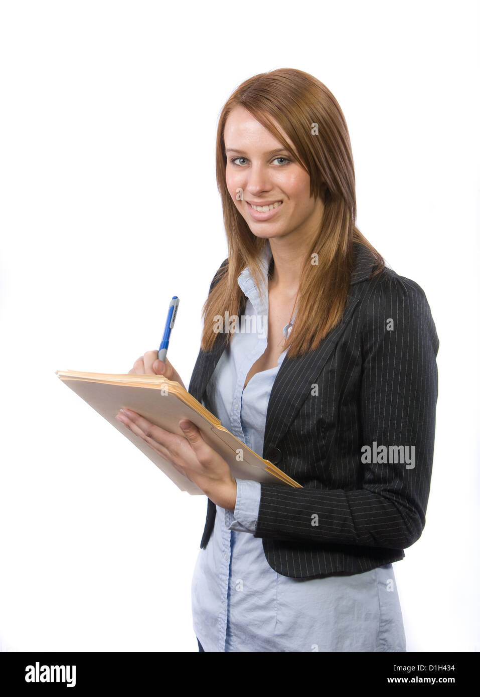 Business Woman Writing notes at desk in a modern office Stock Photo - Alamy