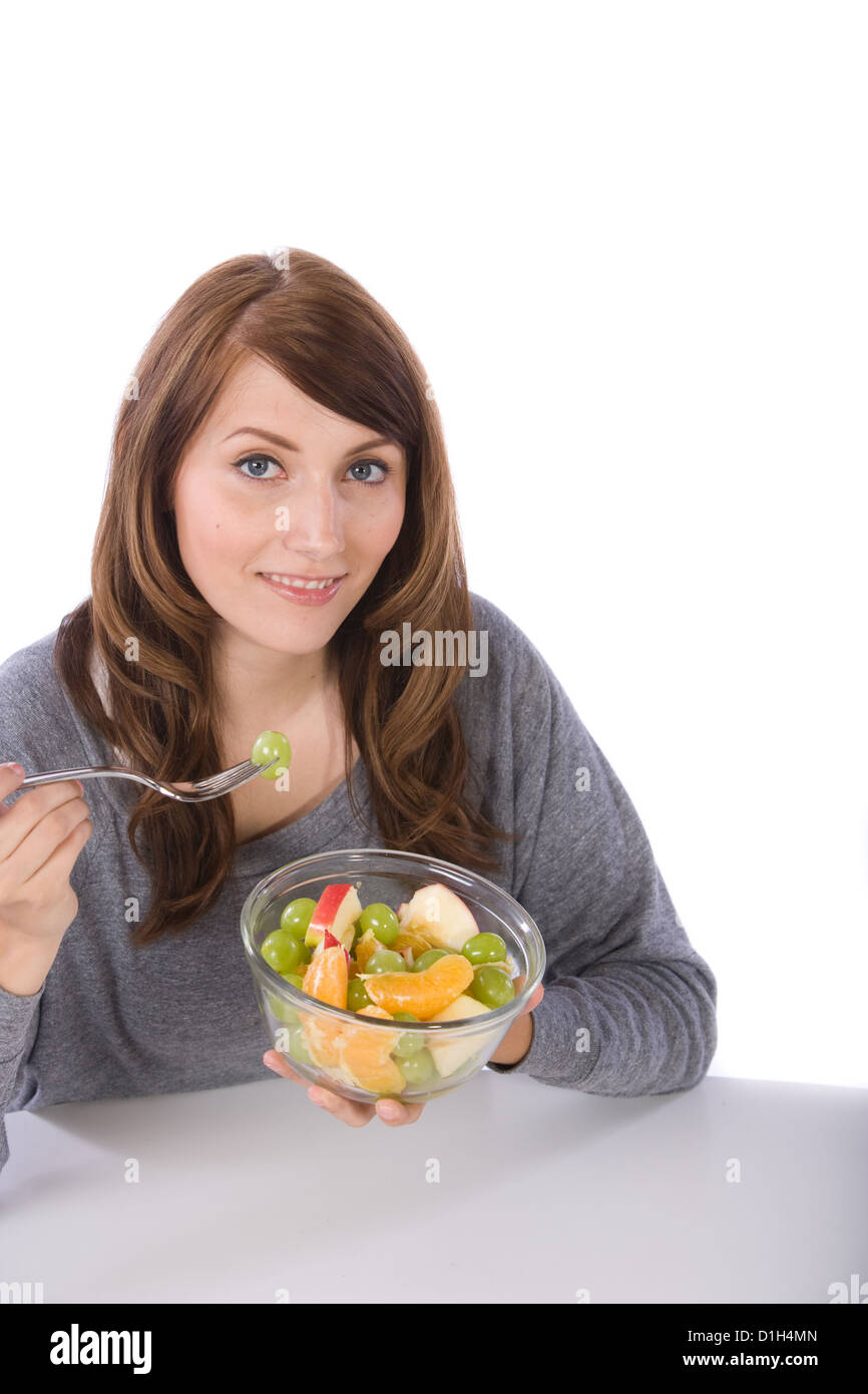 Woman Eating Fresh Fruit Isolated on White Stock Photo - Alamy