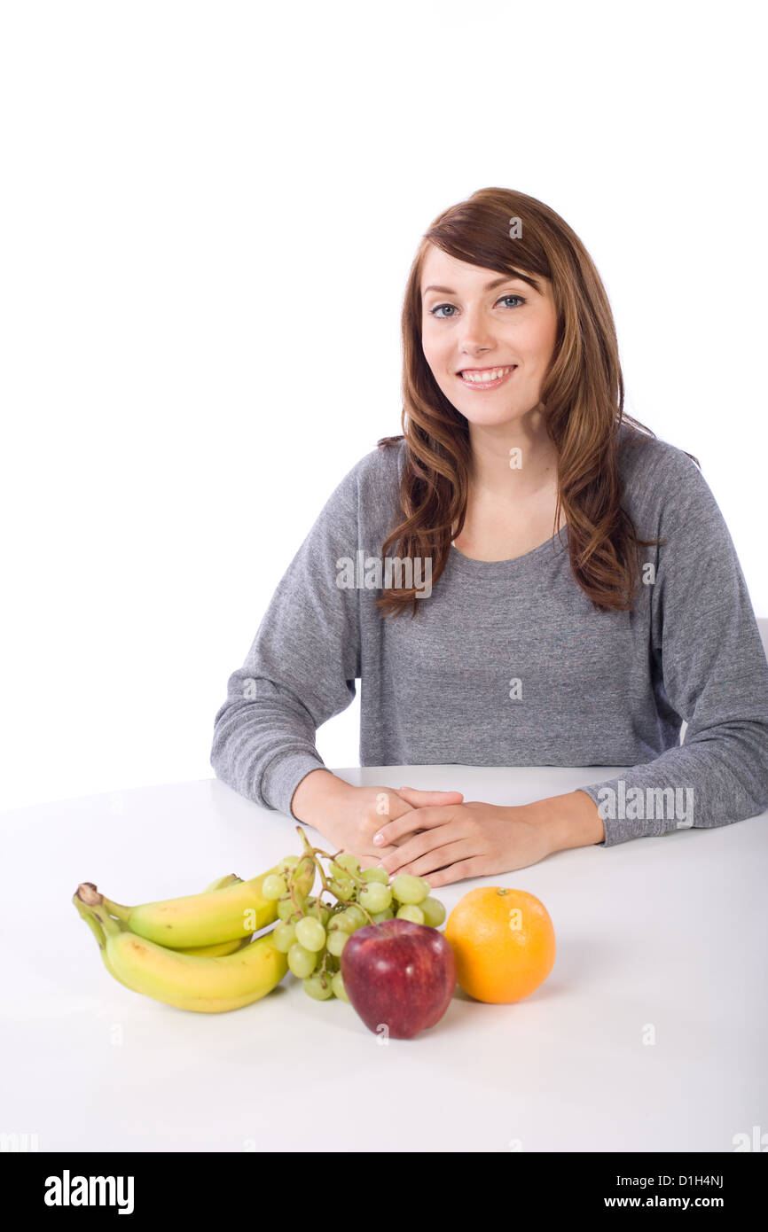 Woman Eating Fresh Fruit Isolated on White Stock Photo - Alamy