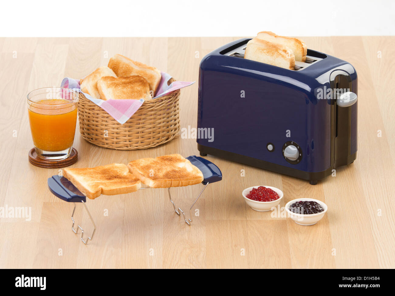 Bread toaster in the kitchen Stock Photo - Alamy