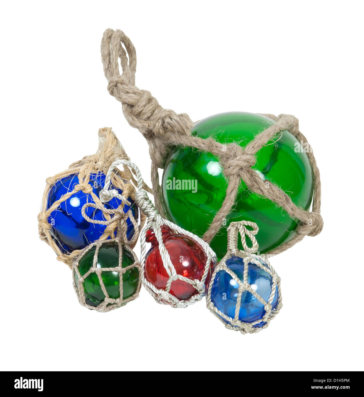 A set of different nautical glass floats tied with rough rope - path ...
