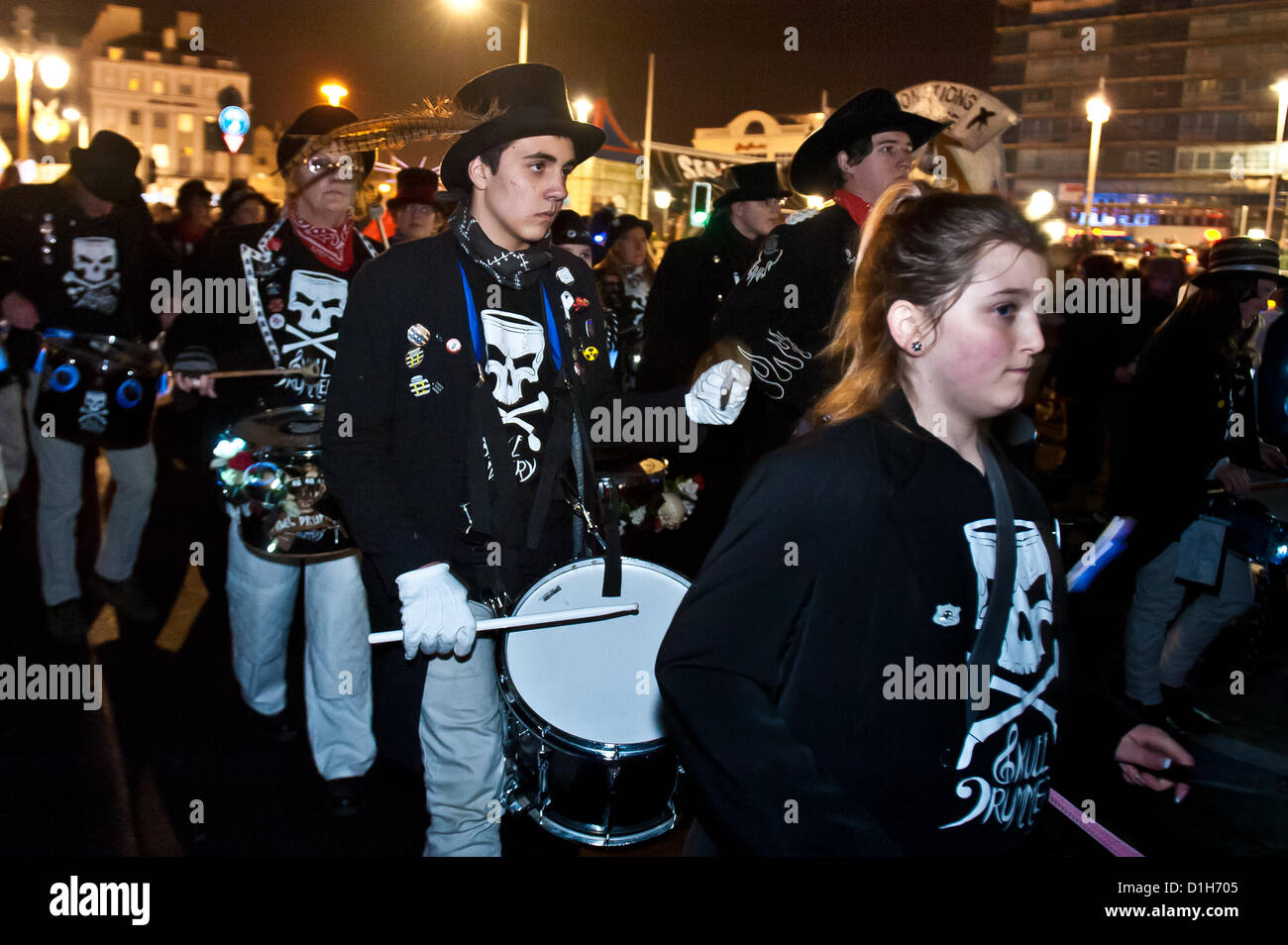 The parade reaches Madeira Drive. Burning the Clocks Lantern lit ...