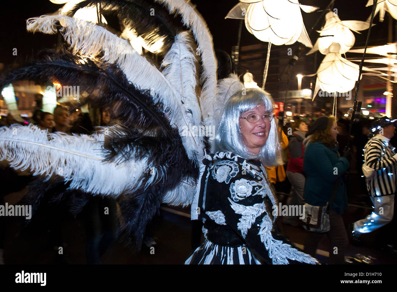 The parade reaches Madeira Drive. Burning the Clocks Lantern lit ...