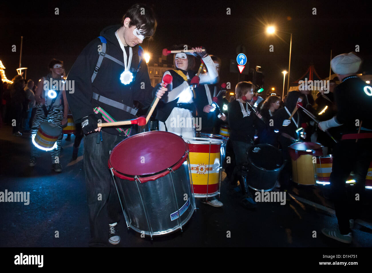 The parade reaches Madeira Drive. Burning the Clocks Lantern lit ...