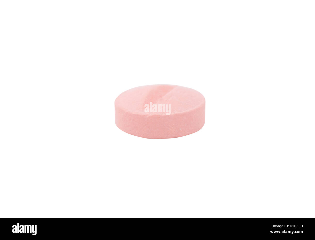 Pink pill on white background Stock Photo - Alamy