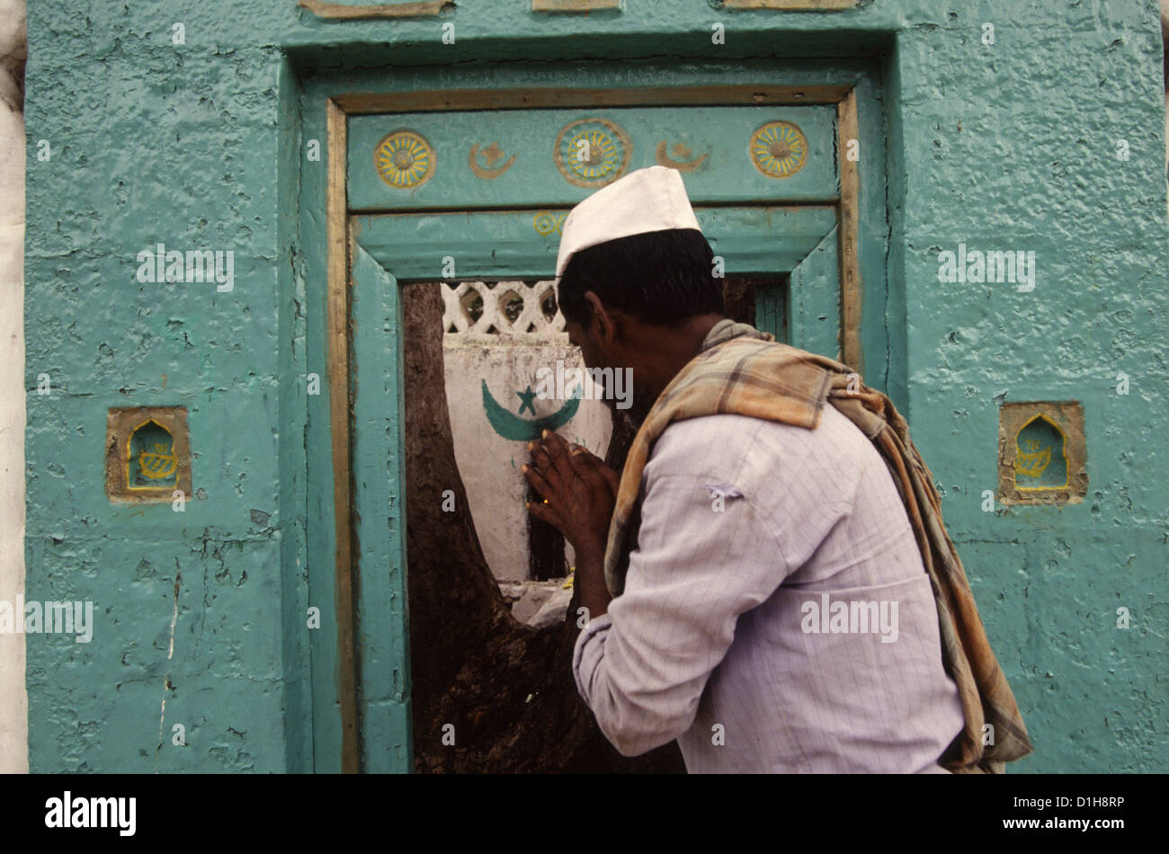 A member of the Muslim community entering a mosque in Bijapur ...