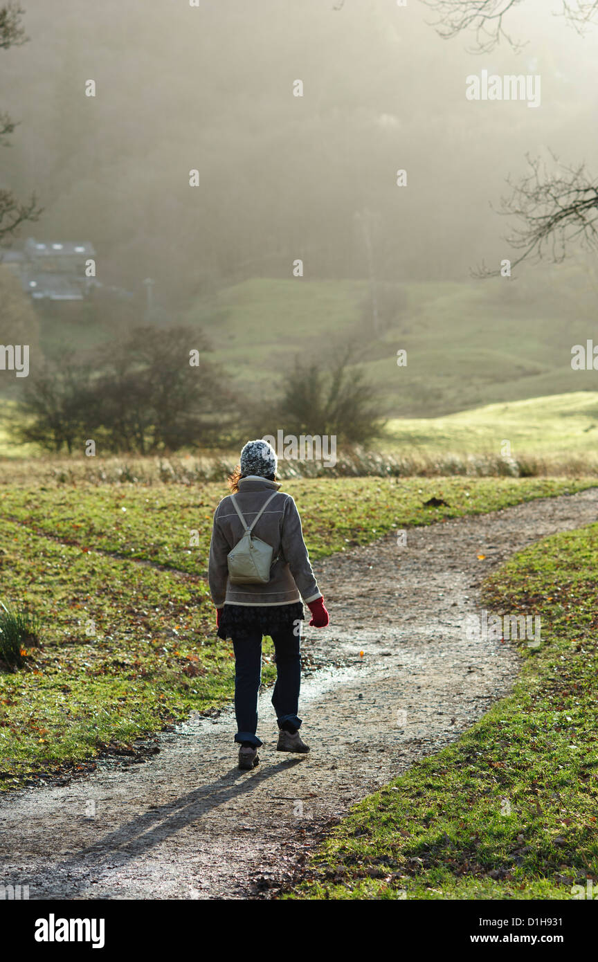 Women walking in the Lake District on a cold, misty morning Stock Photo ...