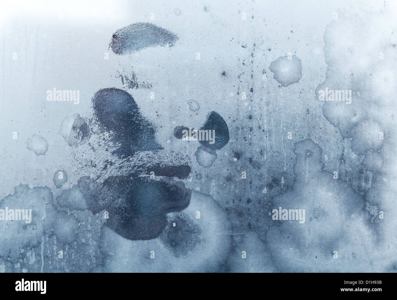 Male face print on frozen windows glass Stock Photo - Alamy