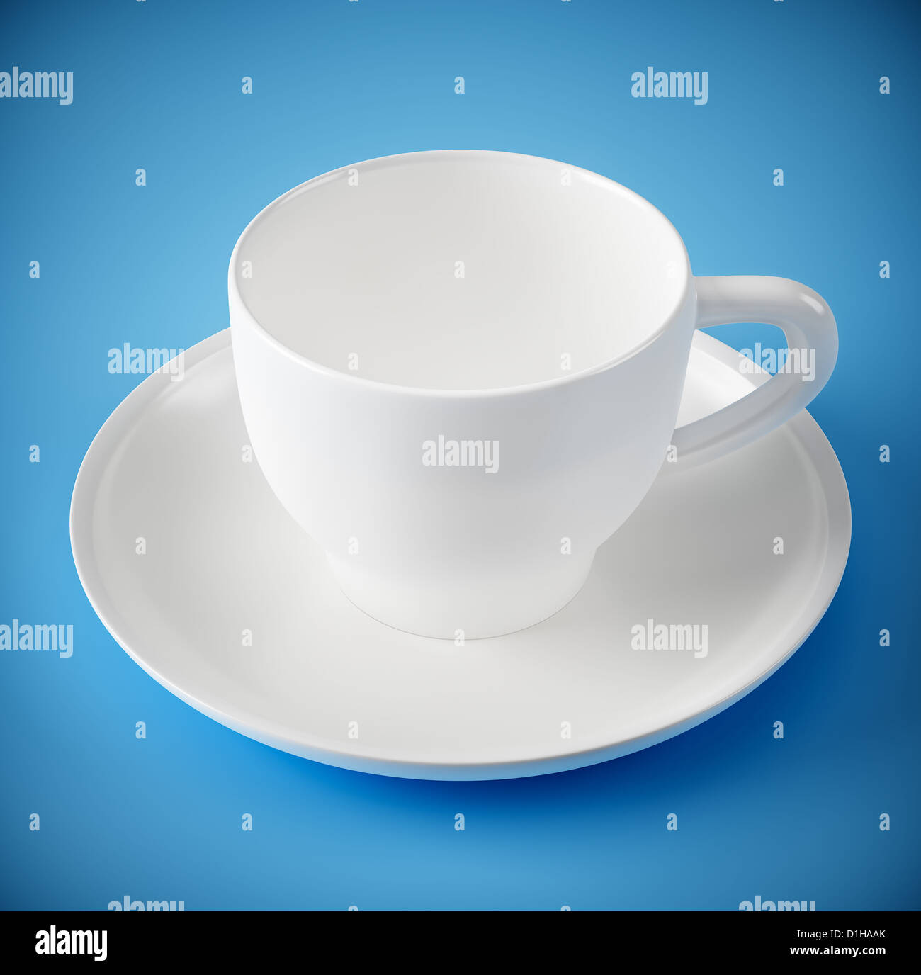 white cup and plate on blue background Stock Photo - Alamy