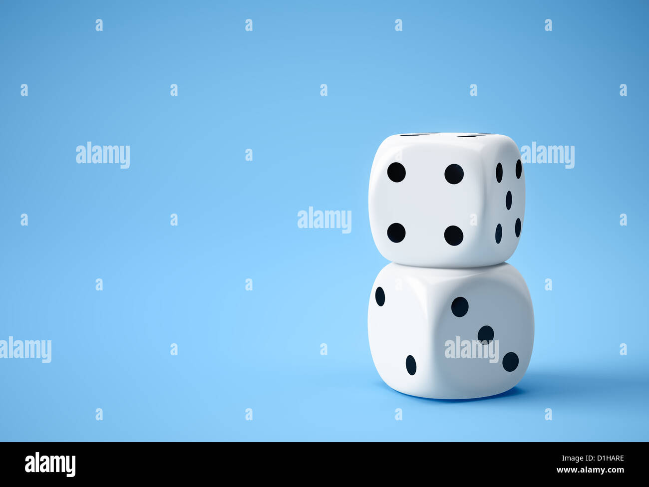 two big white dices on blue background Stock Photo - Alamy