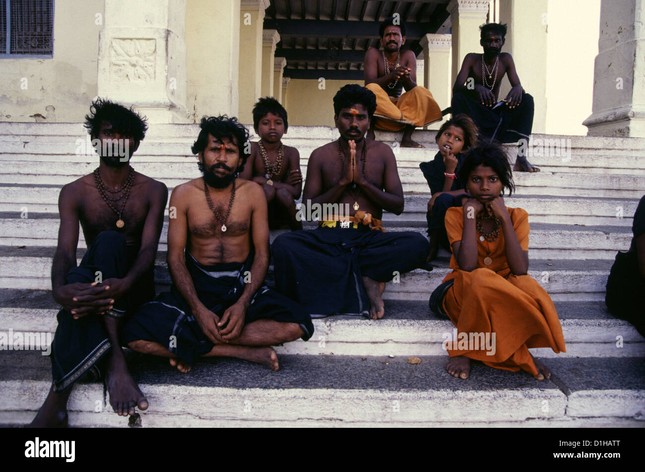 Group of Hindu pilgrims wearing traditional longi or sarong clothing in ...