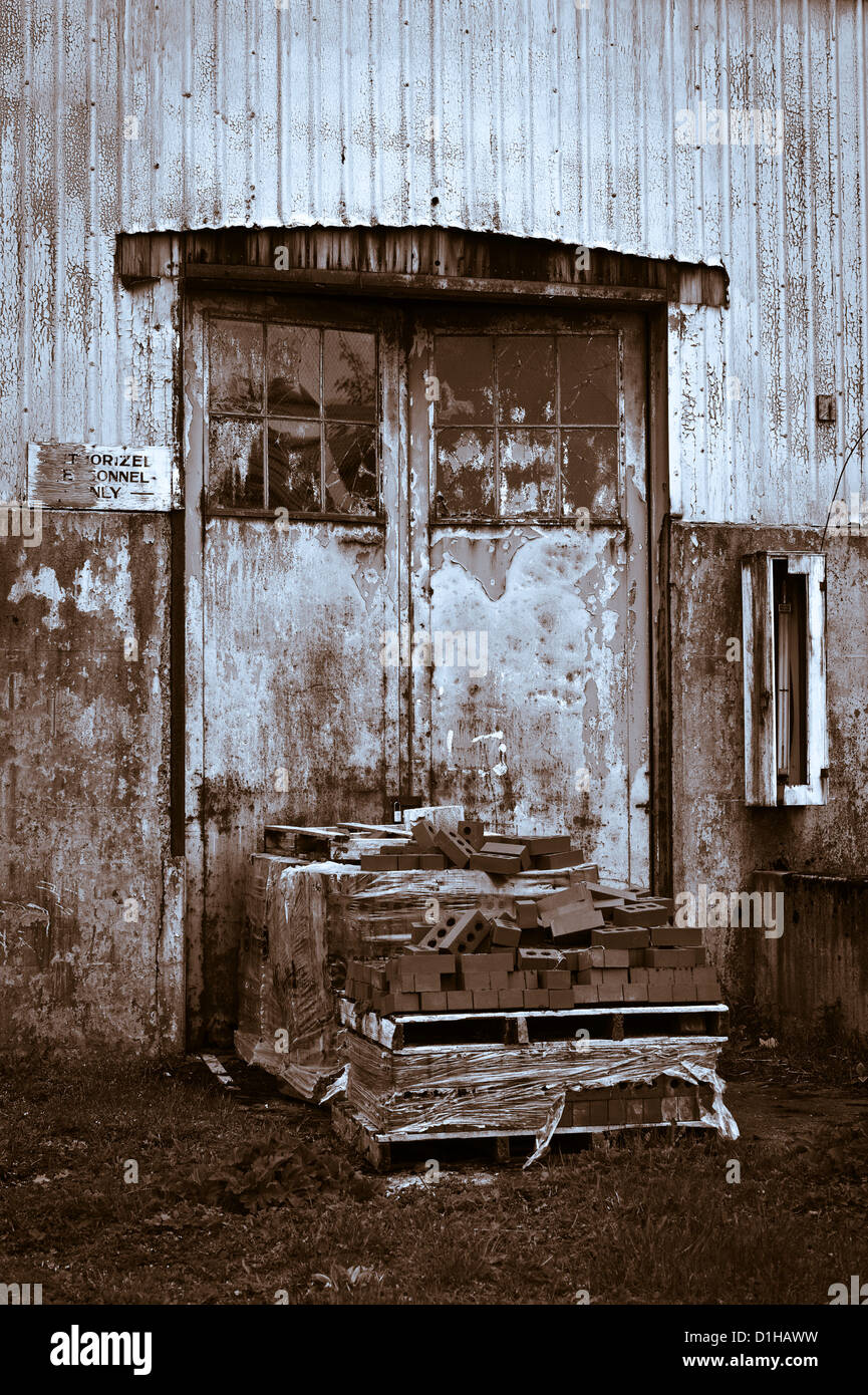New bricks stacked on pallets outside old World War II US Navy base ...